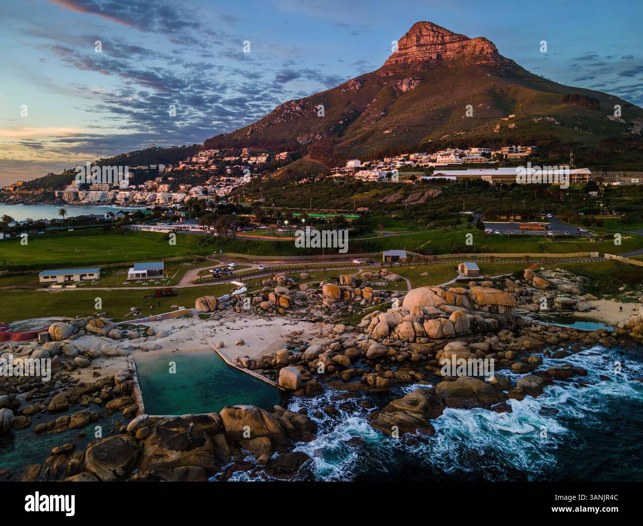 Aerial view of Maidens Cove tidal pool at sunset with Lions Head ...