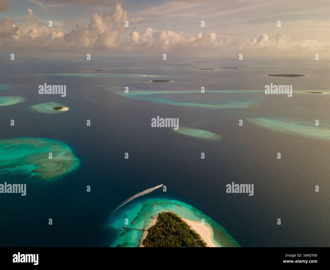 Aerial view of islands with white beach and blue ocean, Baa Atoll ...