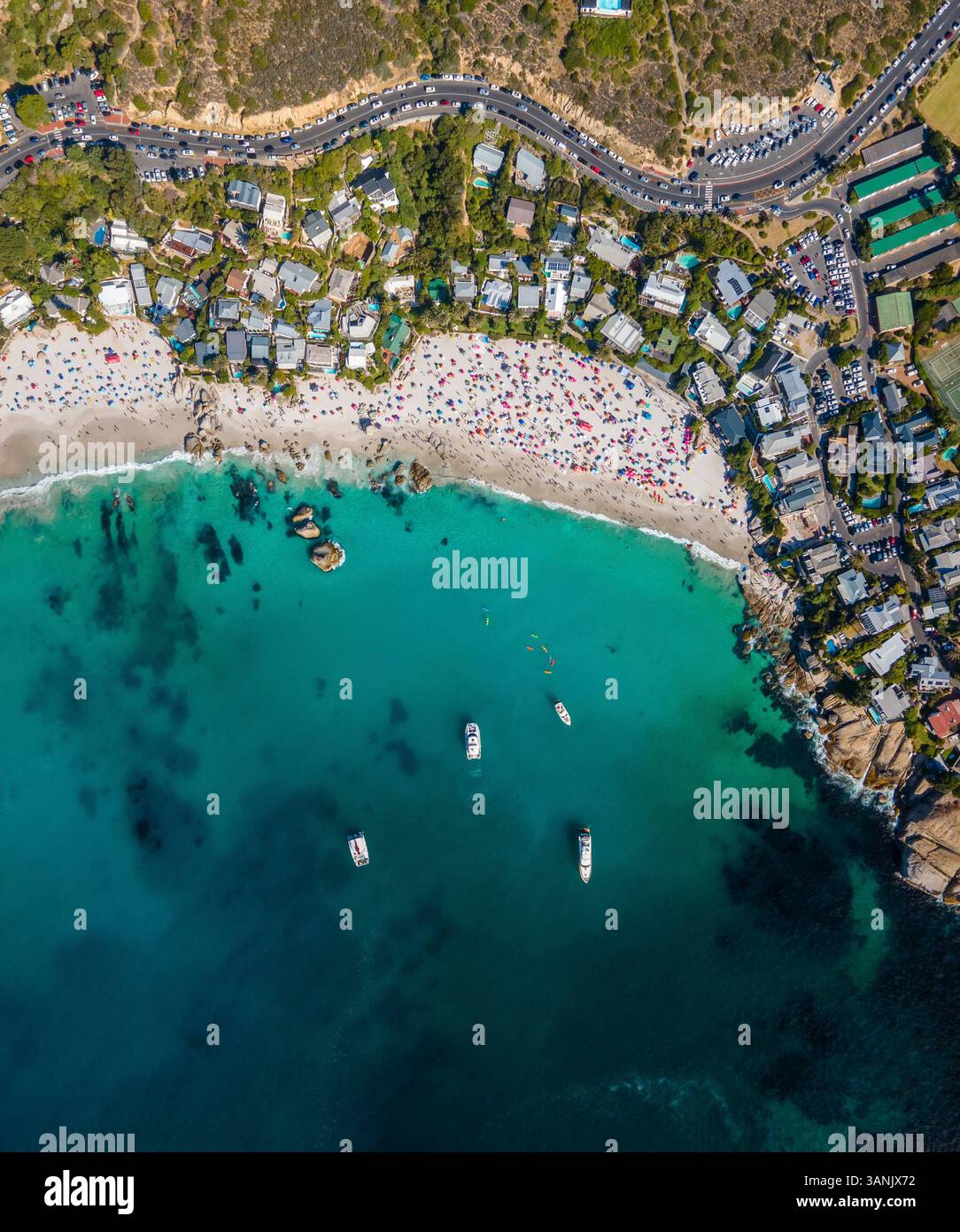 Aerial view of Clifton 4th pristine beach with luxury yachts docked and ...