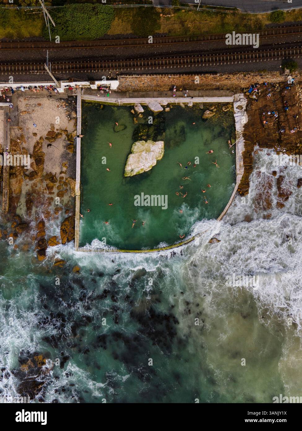 Aerial view of Dalebrook tidal pool early morning swimmers, Cape Town ...