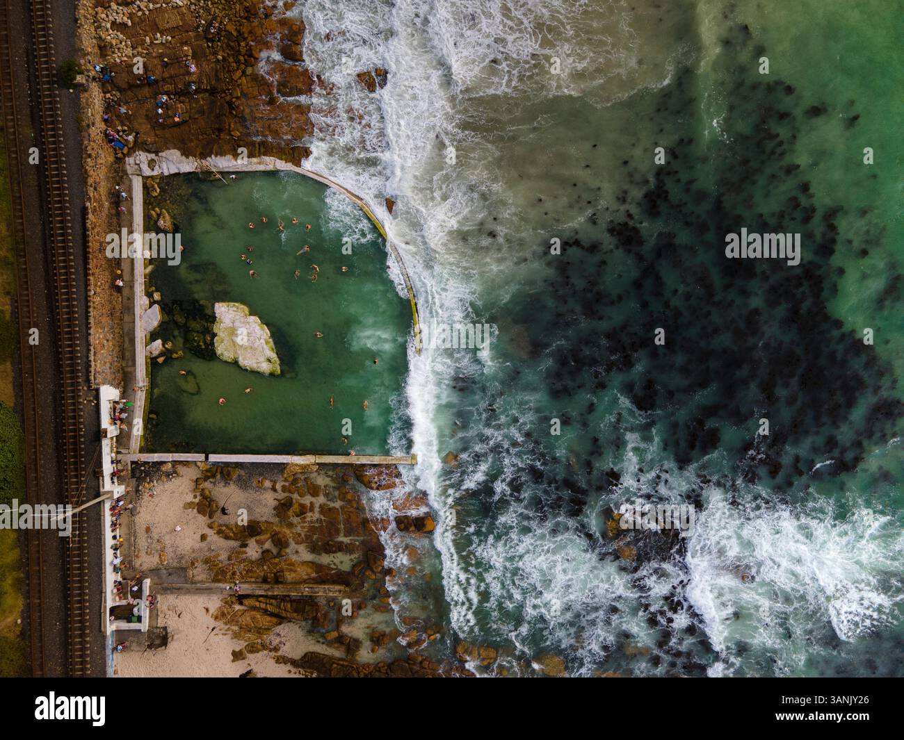 Aerial view of Dalebrook tidal pool early morning swimmers, Cape Town ...