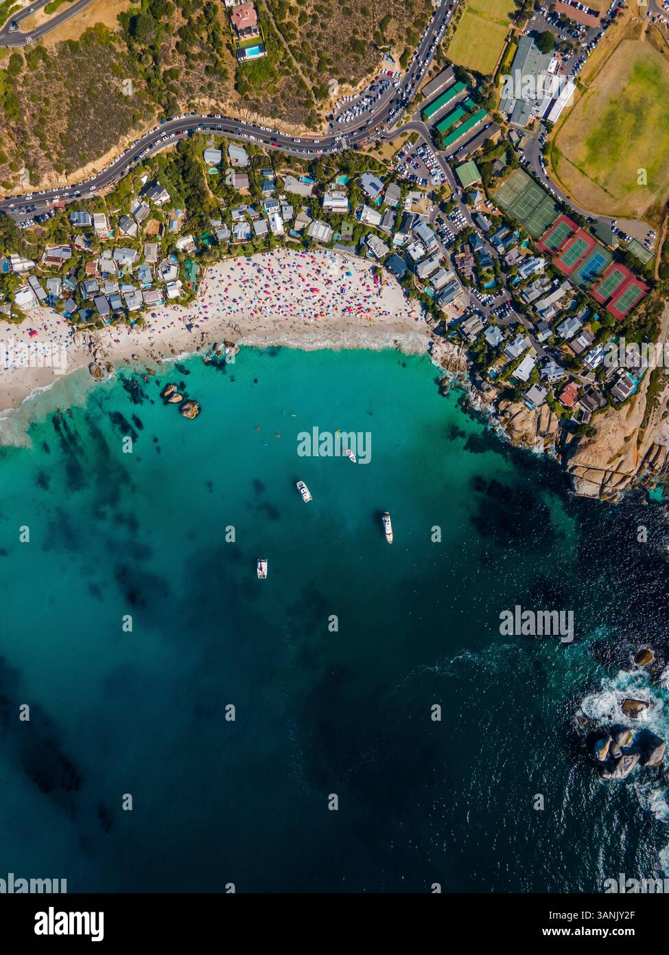 Aerial view of Clifton 4th pristine beach with luxury yachts docked and ...