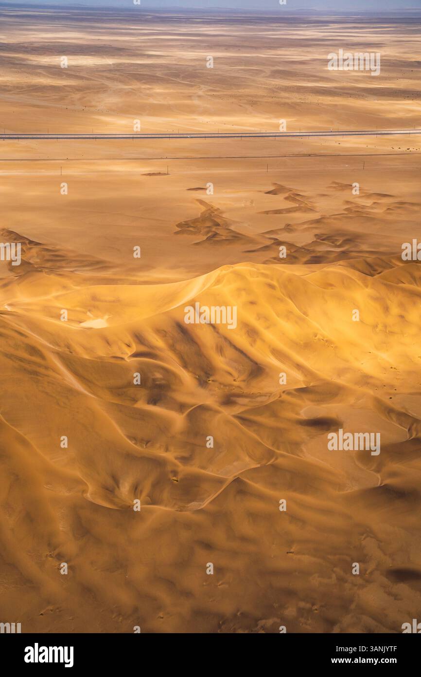 Aerial view of Namibian Desert dunes near Swakomund shoreline, Namibia ...