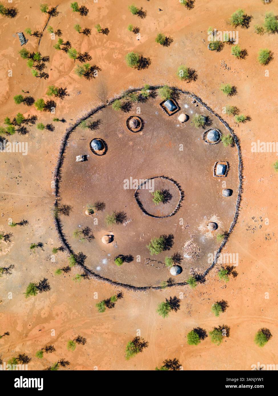 Aerial view of a rural Namibian village in a desert valley, Kunene ...