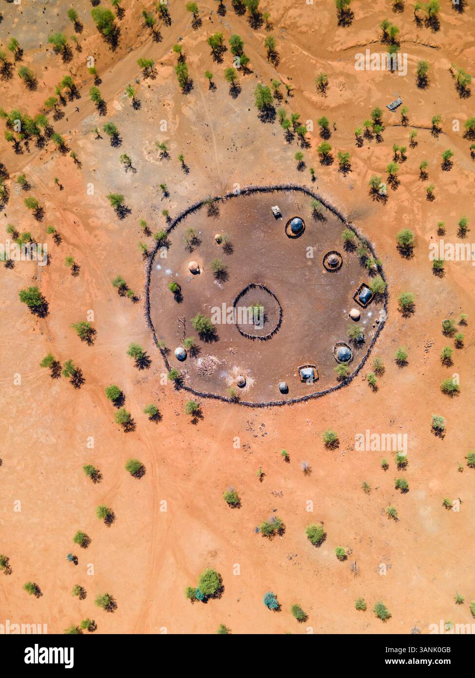 Aerial view of a rural Namibian village in a desert valley, Kunene ...