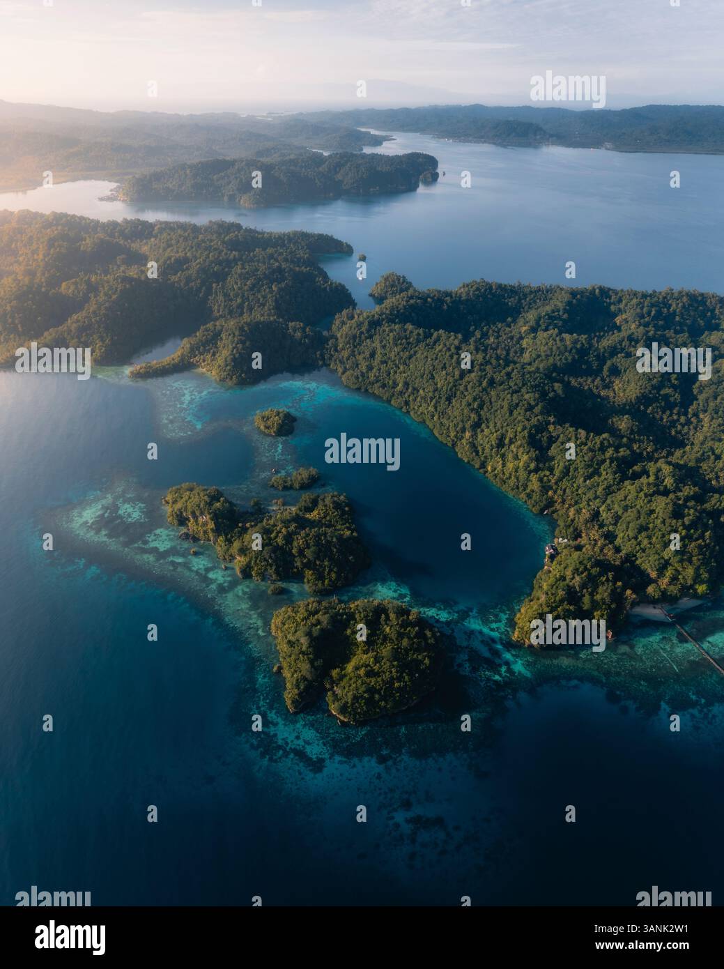Aerial view of beautiful green islands and serene lagoon along the ...