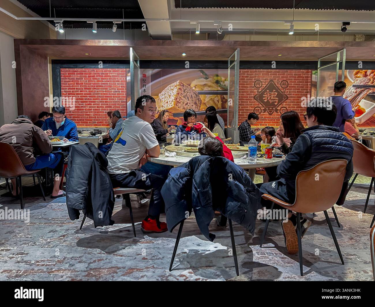 Group family tourists dining table hi-res stock photography and images ...
