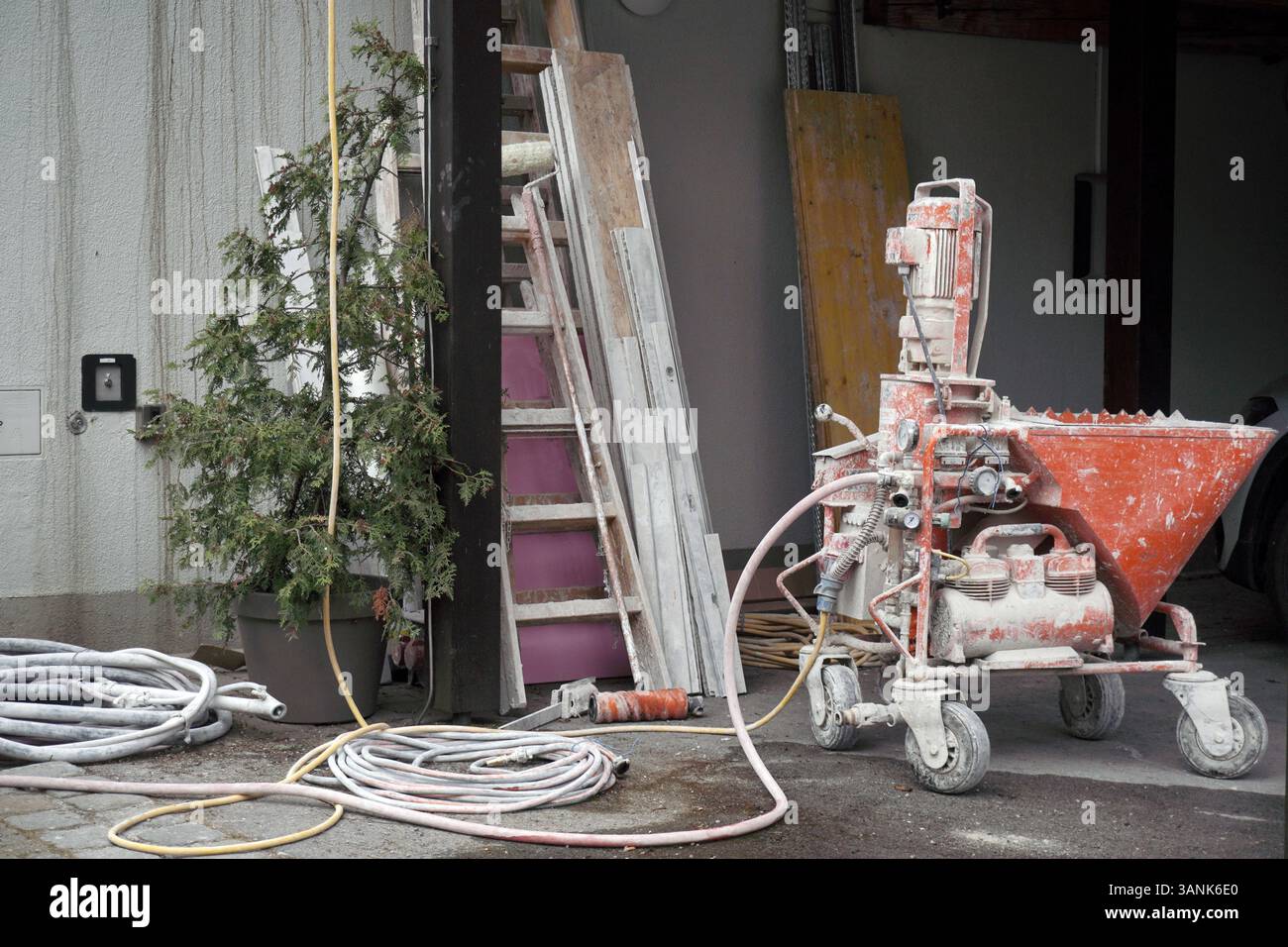 Dirty plastering machine in hi-res stock photography and images - Alamy