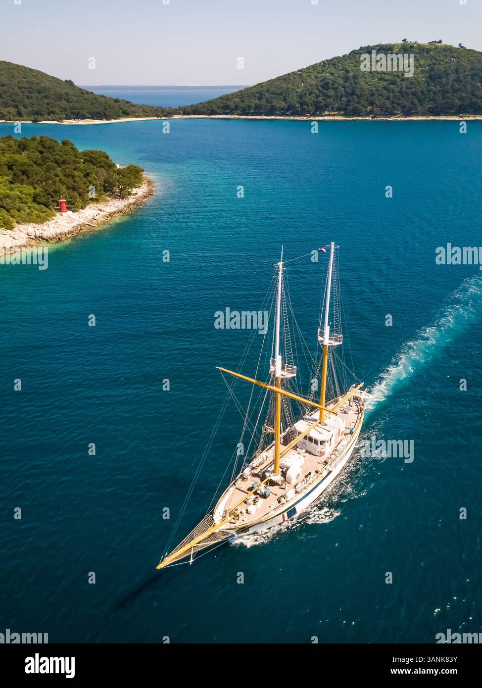 Aerial view of touristic sailing boat crossing the Adriatic sea ...