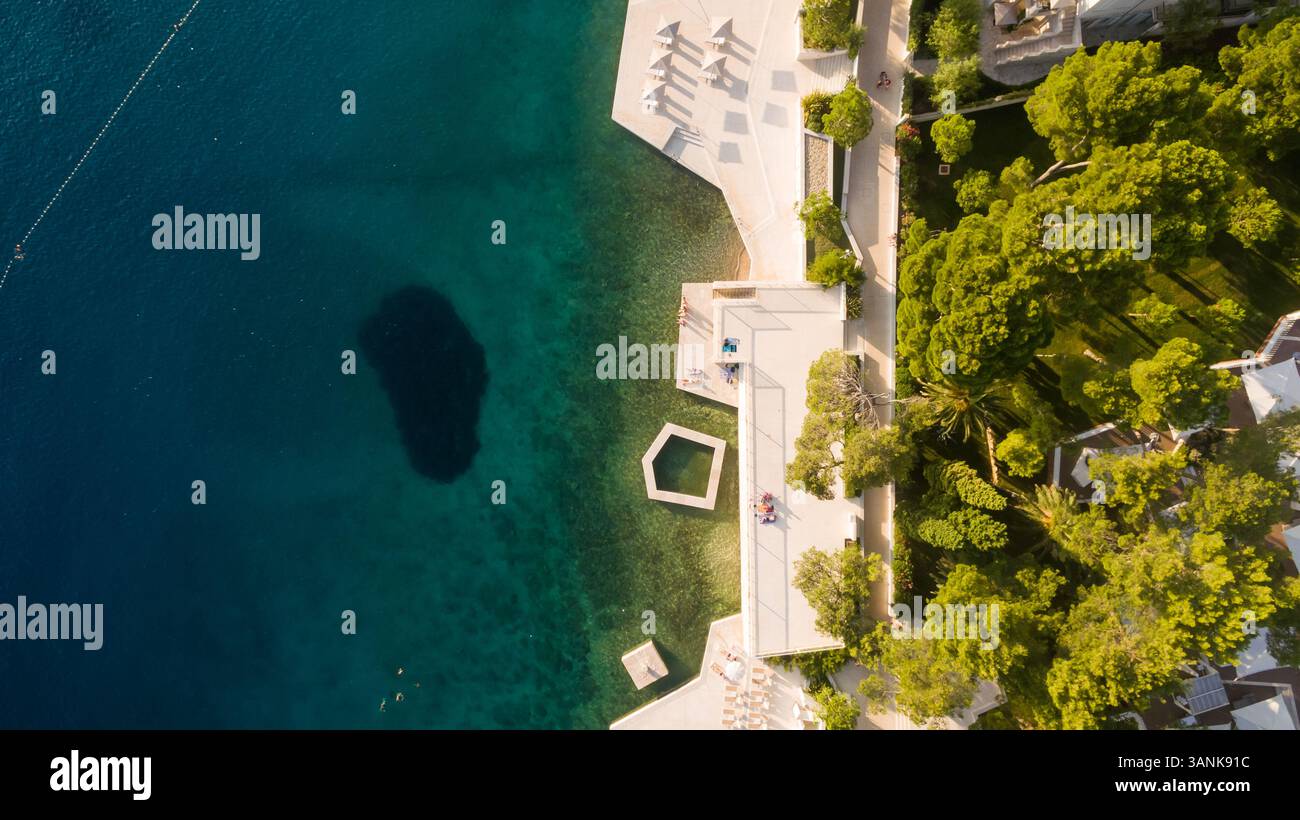 Aerial view of hotel resort sunbathing area during the day, Croatia ...