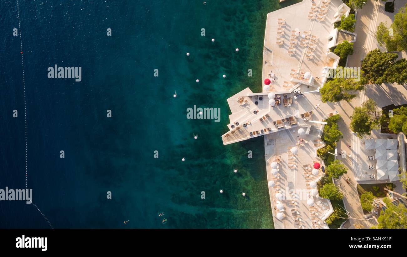 Aerial view of hotel resort sunbathing area during the day, Croatia ...
