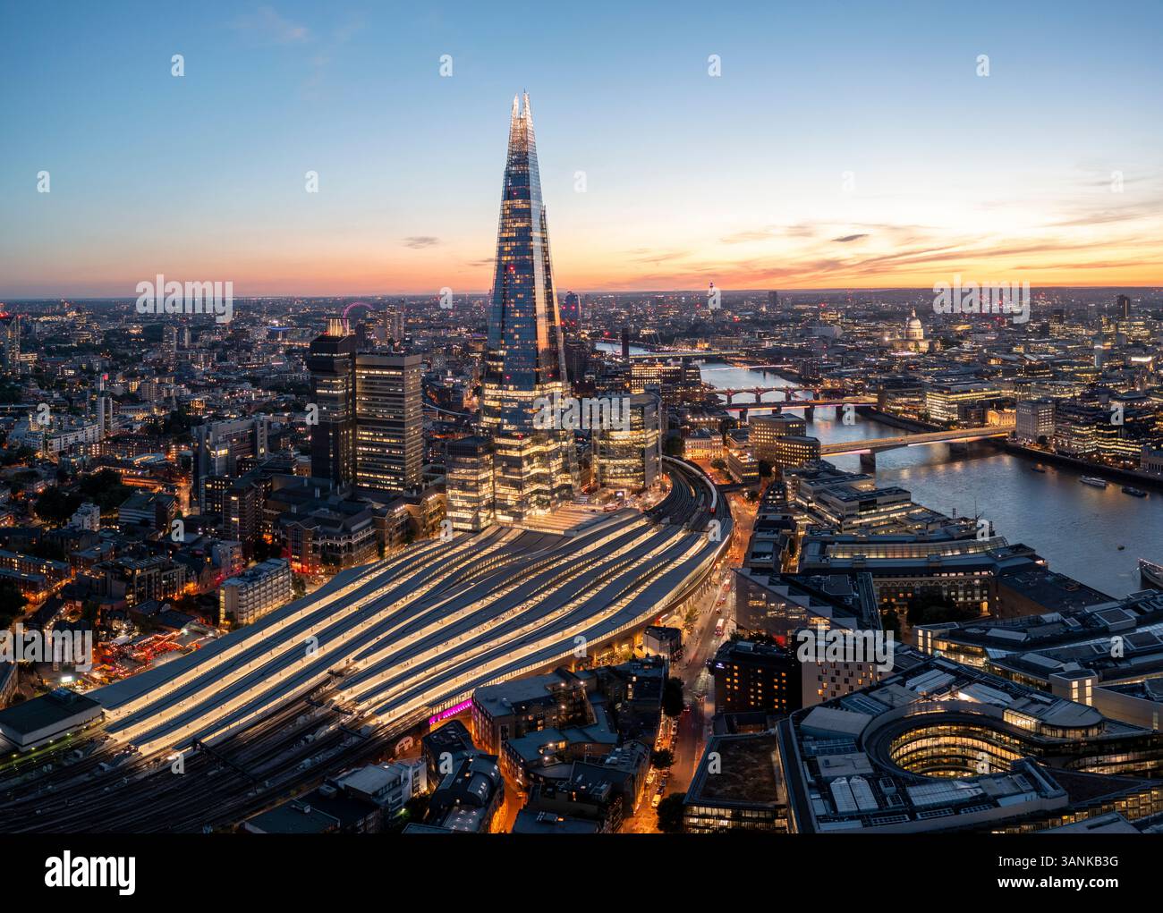 Aerial view of the shard skyscraper illuminated at night with the ...