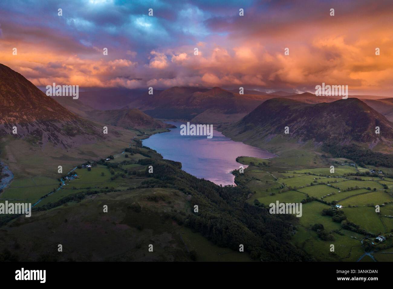 Aerial view of beautiful Buttermere lake surrounded by majestic ...