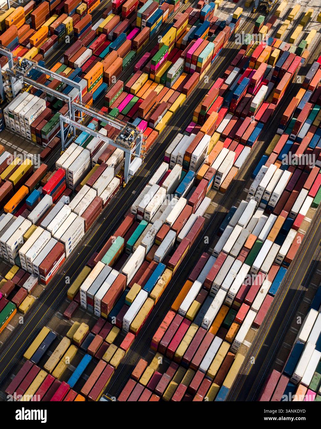 Aerial view of colorful shipping containers and cranes at Corringham ...