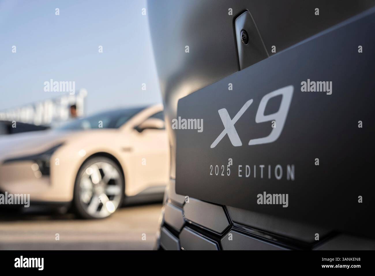 An XPeng X9 electric vehicle is displayed at the company's showcase ...