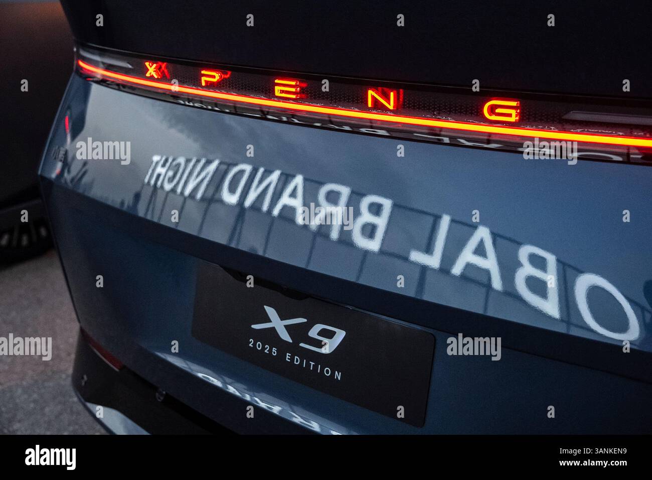 An XPeng X9 electric vehicle is displayed at the company's showcase ...