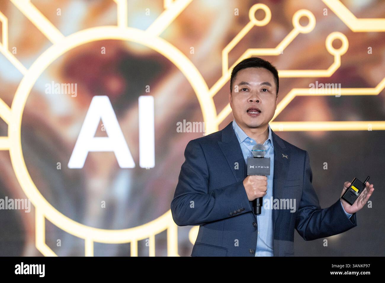 He Xiaopeng, chief executive office of XPeng Motors, speaks at the ...