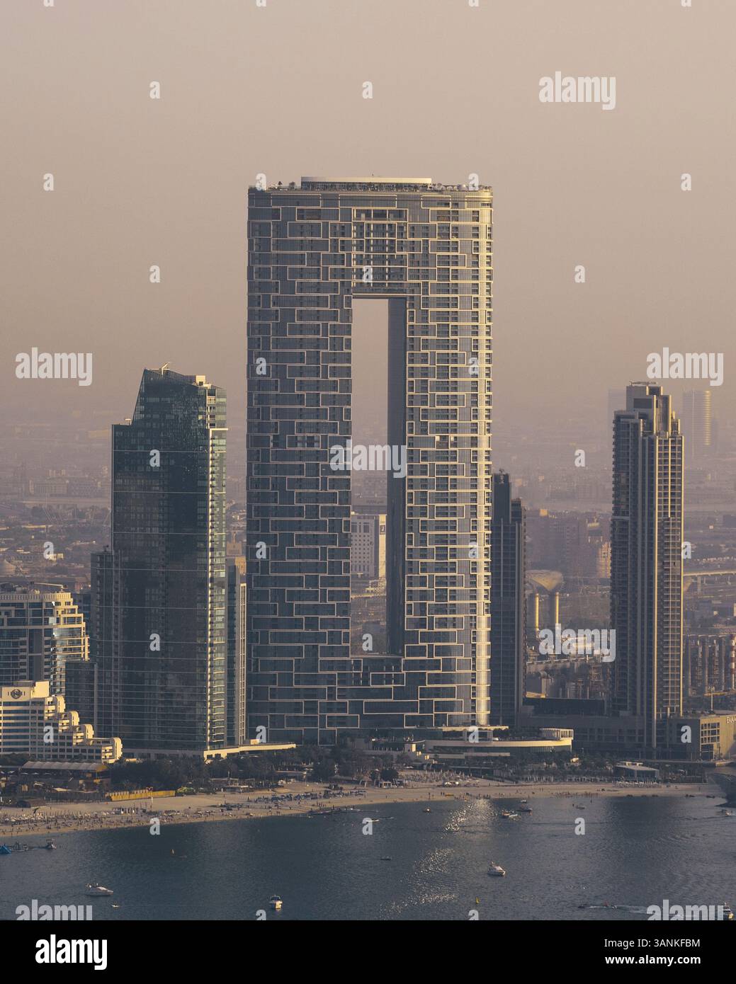 Aerial view of Address beach resort and Dubai skyline at sunset, Dubai ...