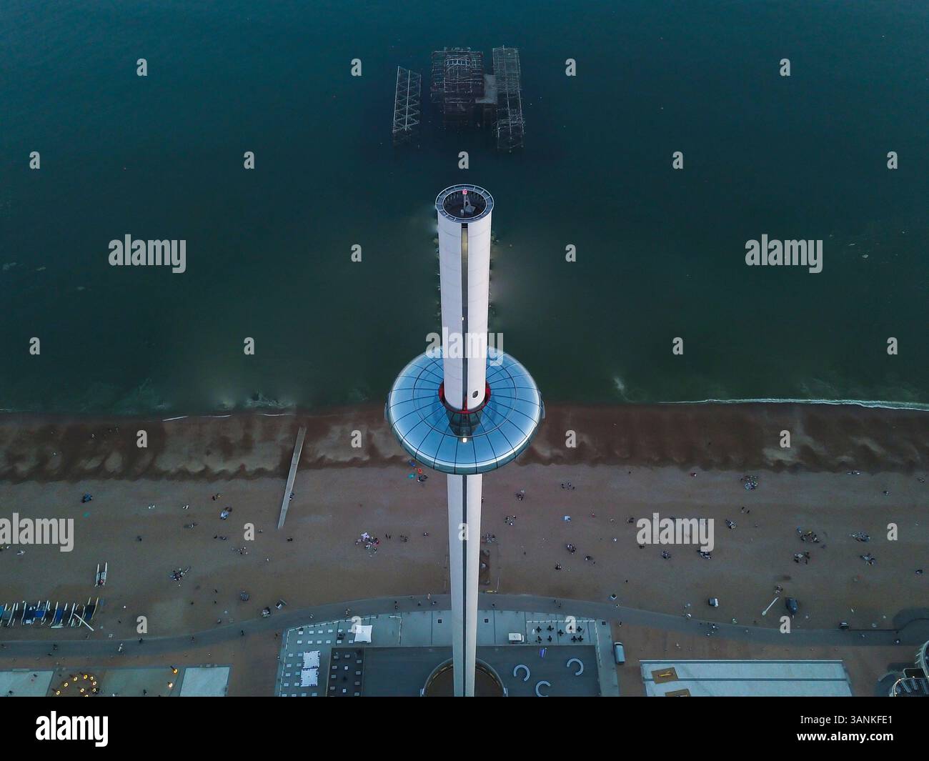 Aerial view of sandy beach and iconic pier with observation tower at ...