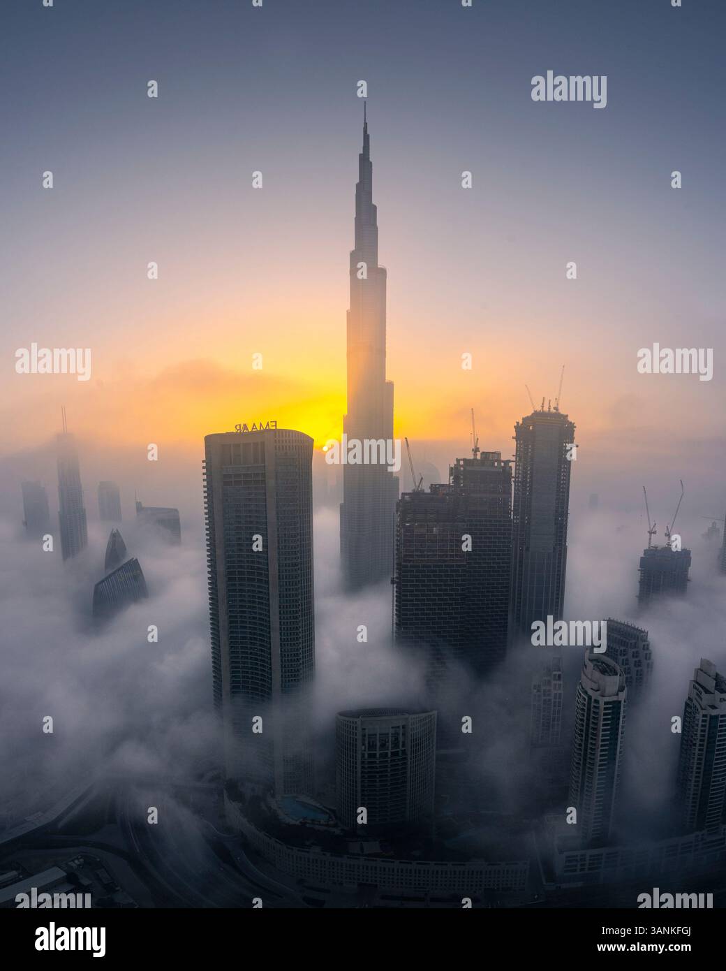 Aerial view of Downtown Dubai with Burj Khalifa, mist and fog, United ...