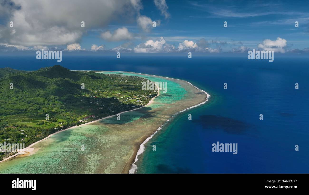 Aerial view of tropical reef and ocean with idyllic island and ...