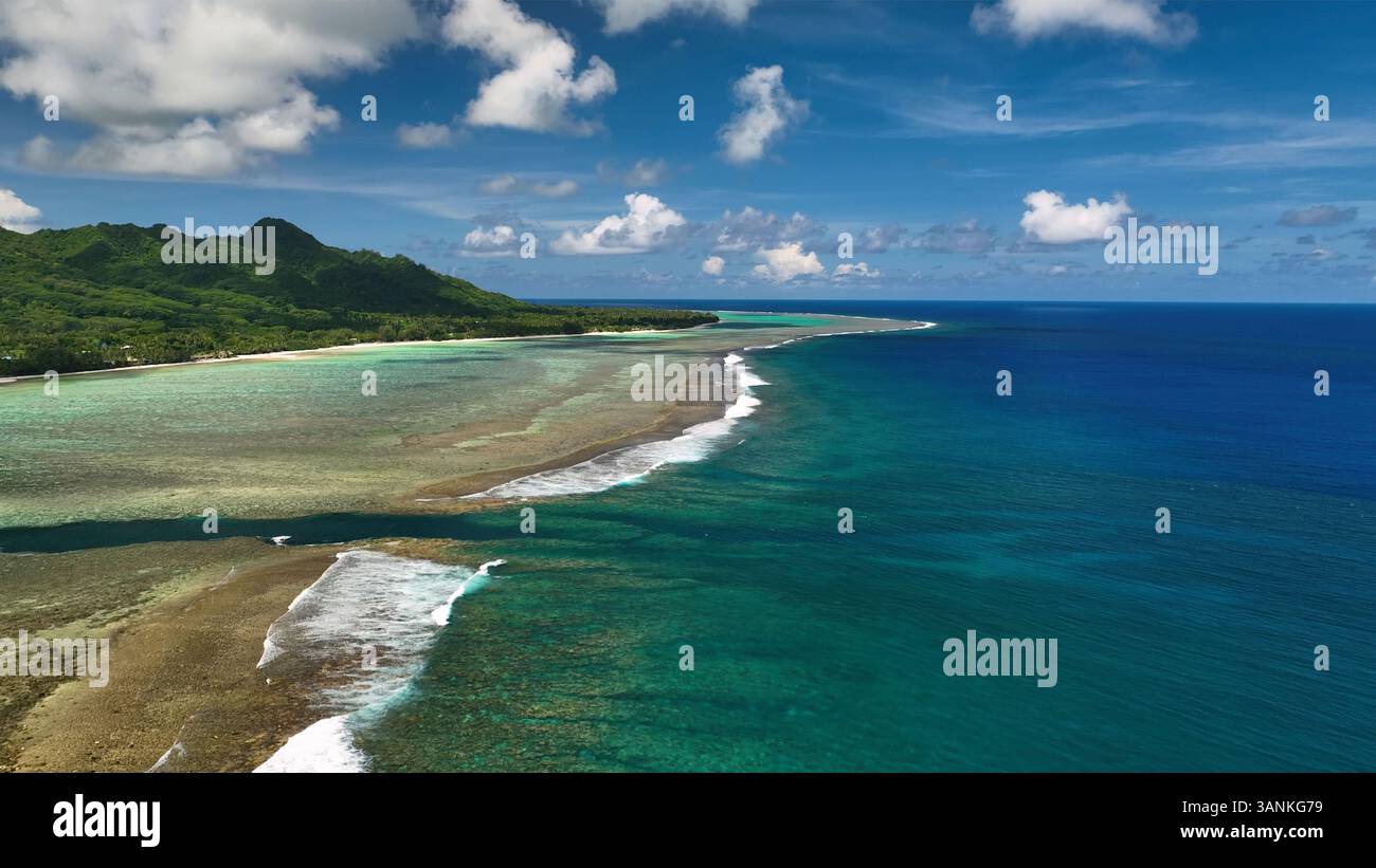Aerial view of tropical coral reef and pristine beach with crystal ...