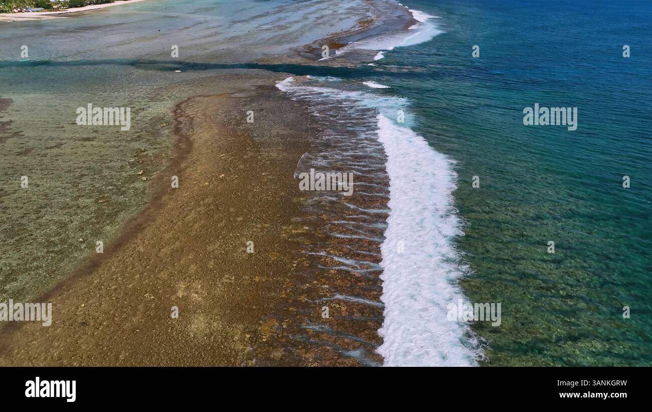 Aerial view of tropical islands and coral reef in the clear blue ocean ...