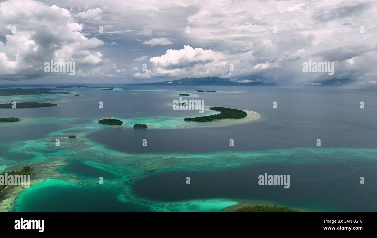 Aerial view of tropical islands with serene reef and tranquil ocean ...