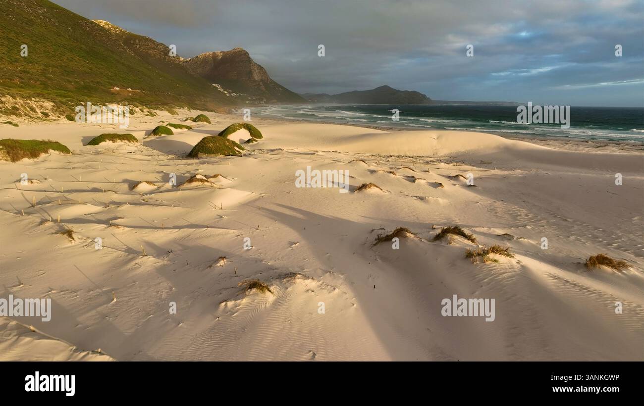 Aerial view of misty cliffs and serene beach under clouds, Misty Cliffs ...