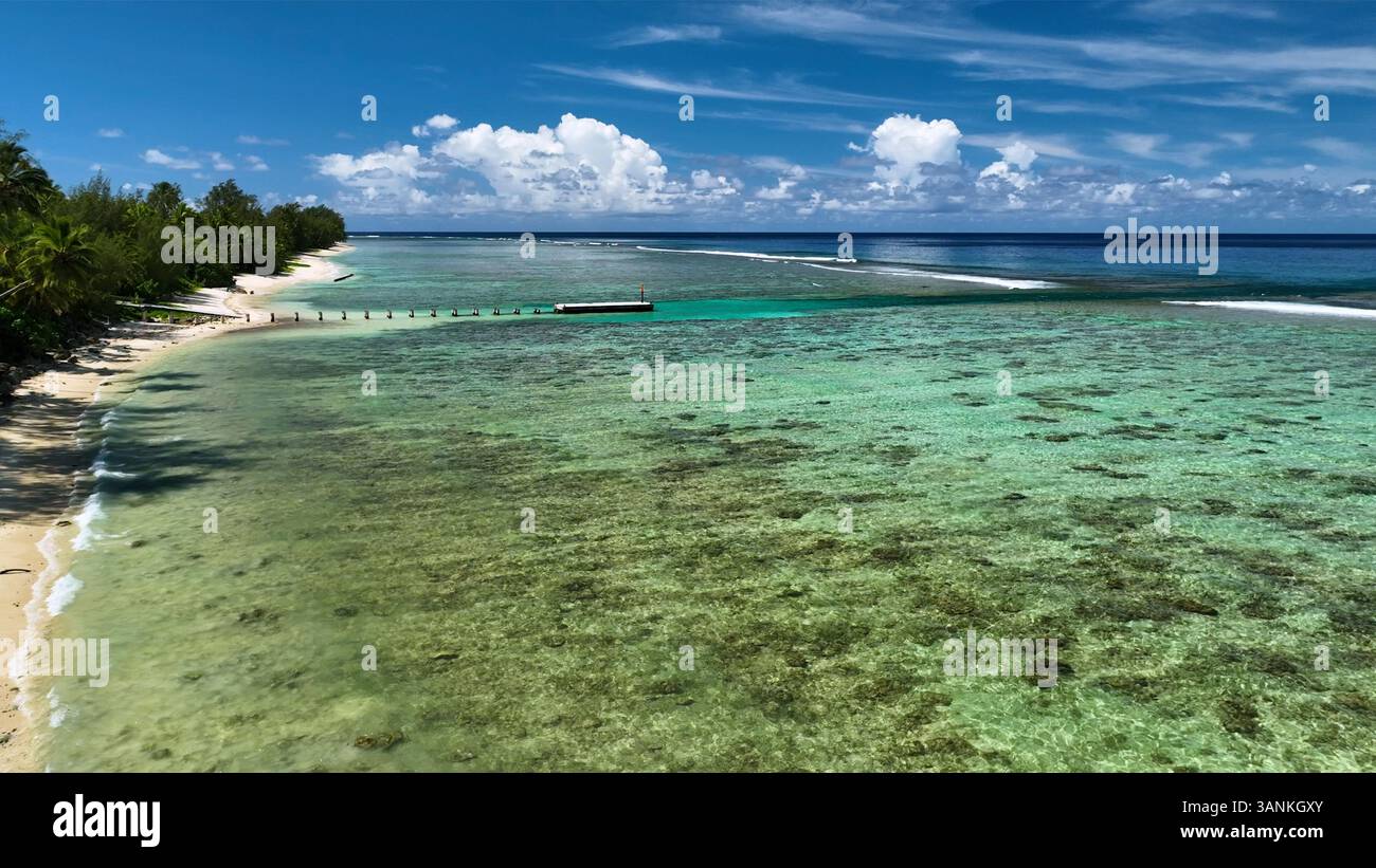 Aerial view of tropical reef and beautiful beach with clear water ...