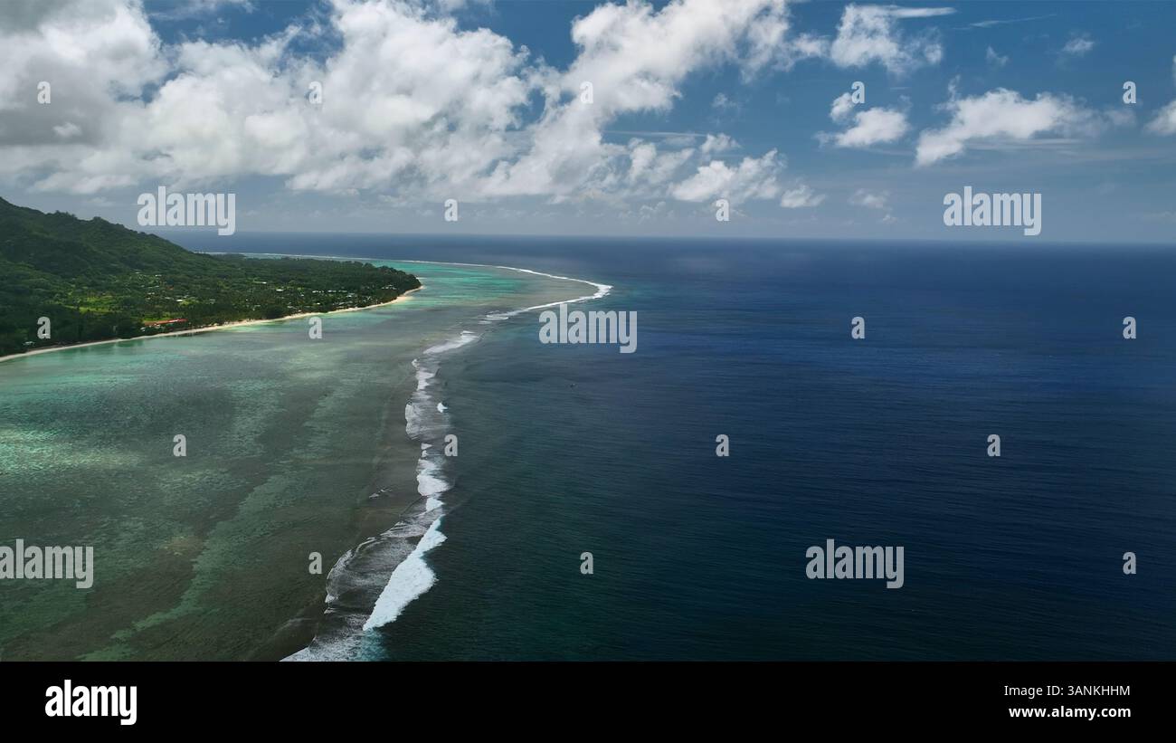 Aerial view of beautiful tropical reef and pristine beach with clear ...
