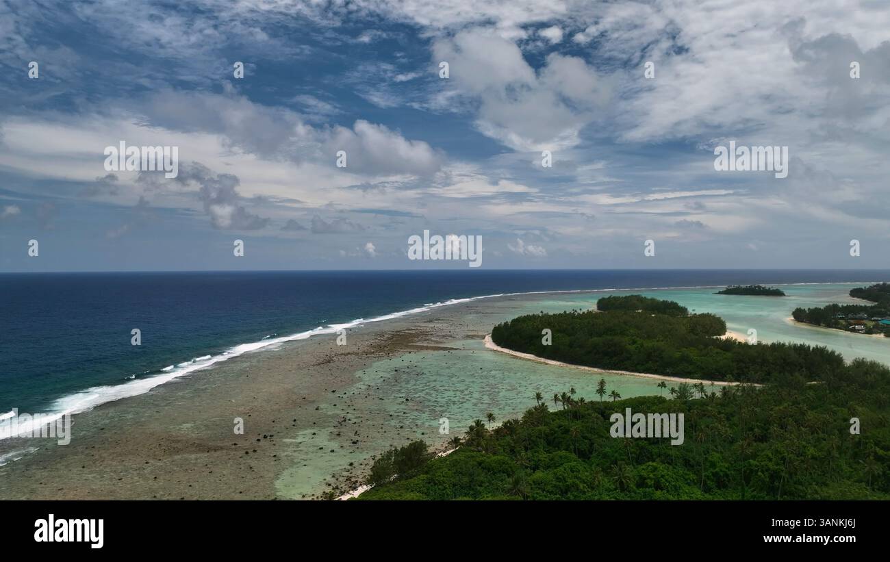 Aerial view of tropical paradise with pristine beach and azure waters ...