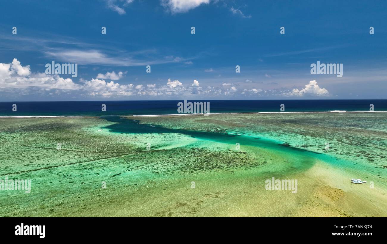 Aerial view of tropical reef and pristine ocean with turquoise water ...