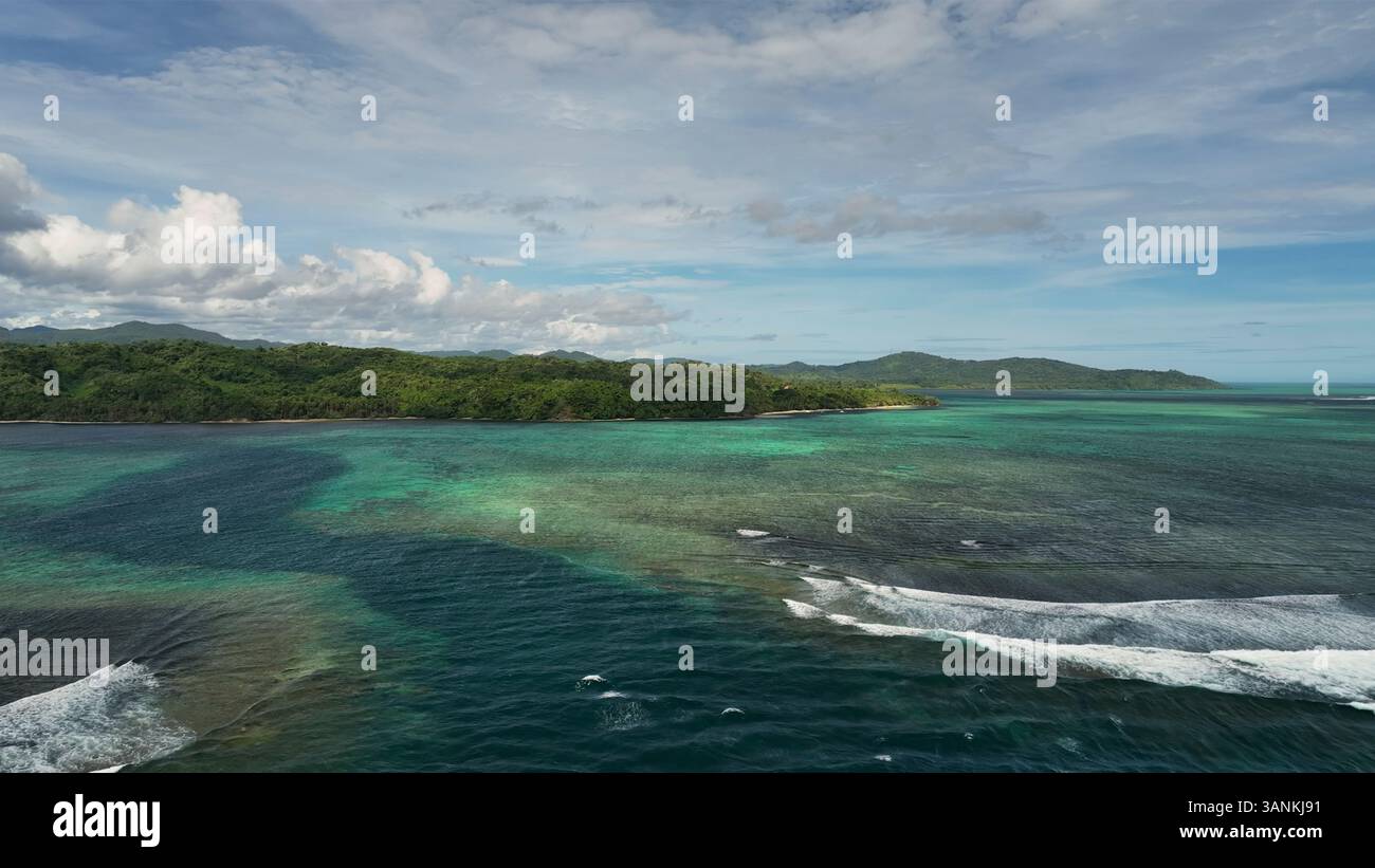 Aerial view of tropical island with coral reef and turquoise ocean ...