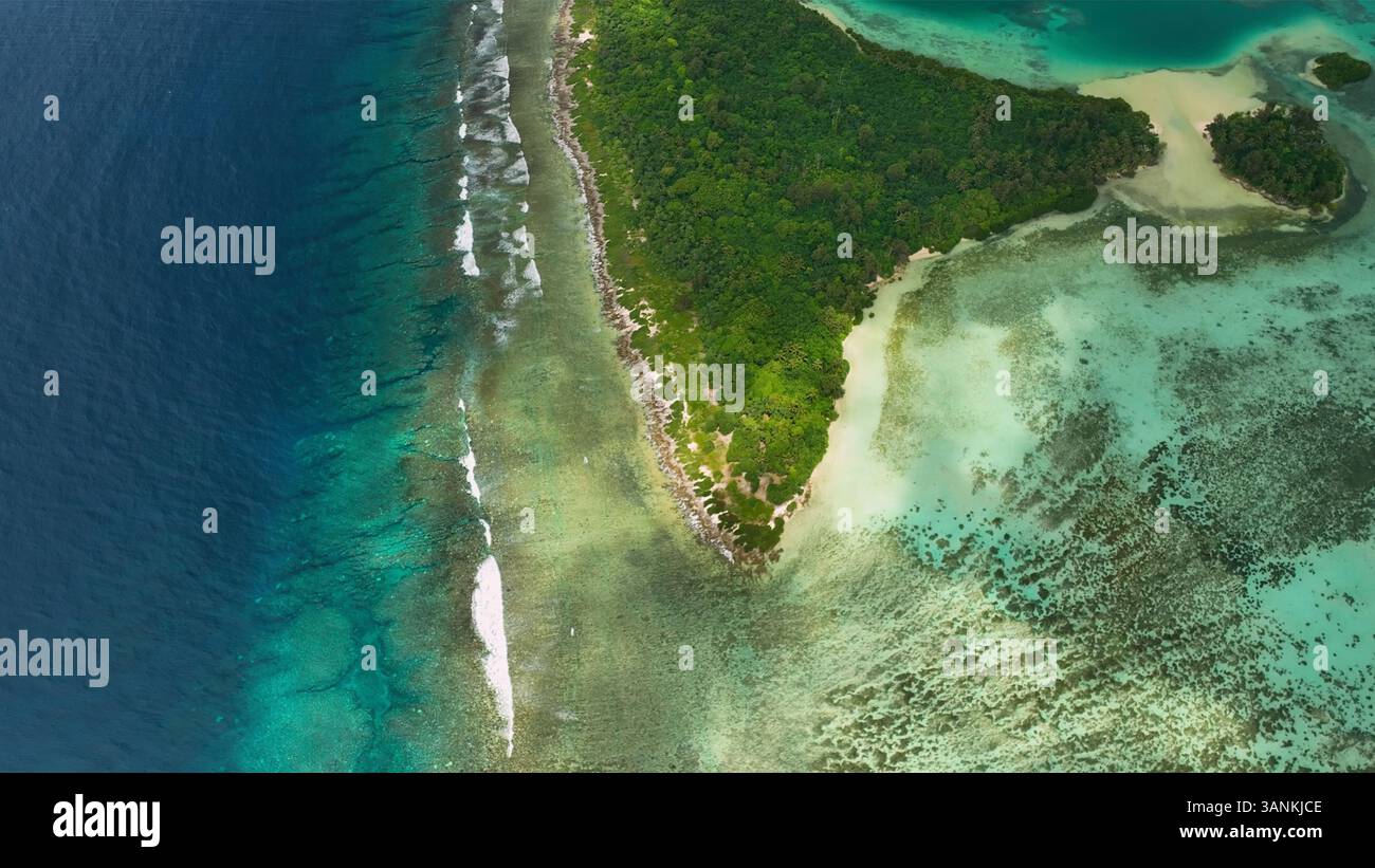 Aerial view of abstract reef and waves in turquoise water, Port Vila ...