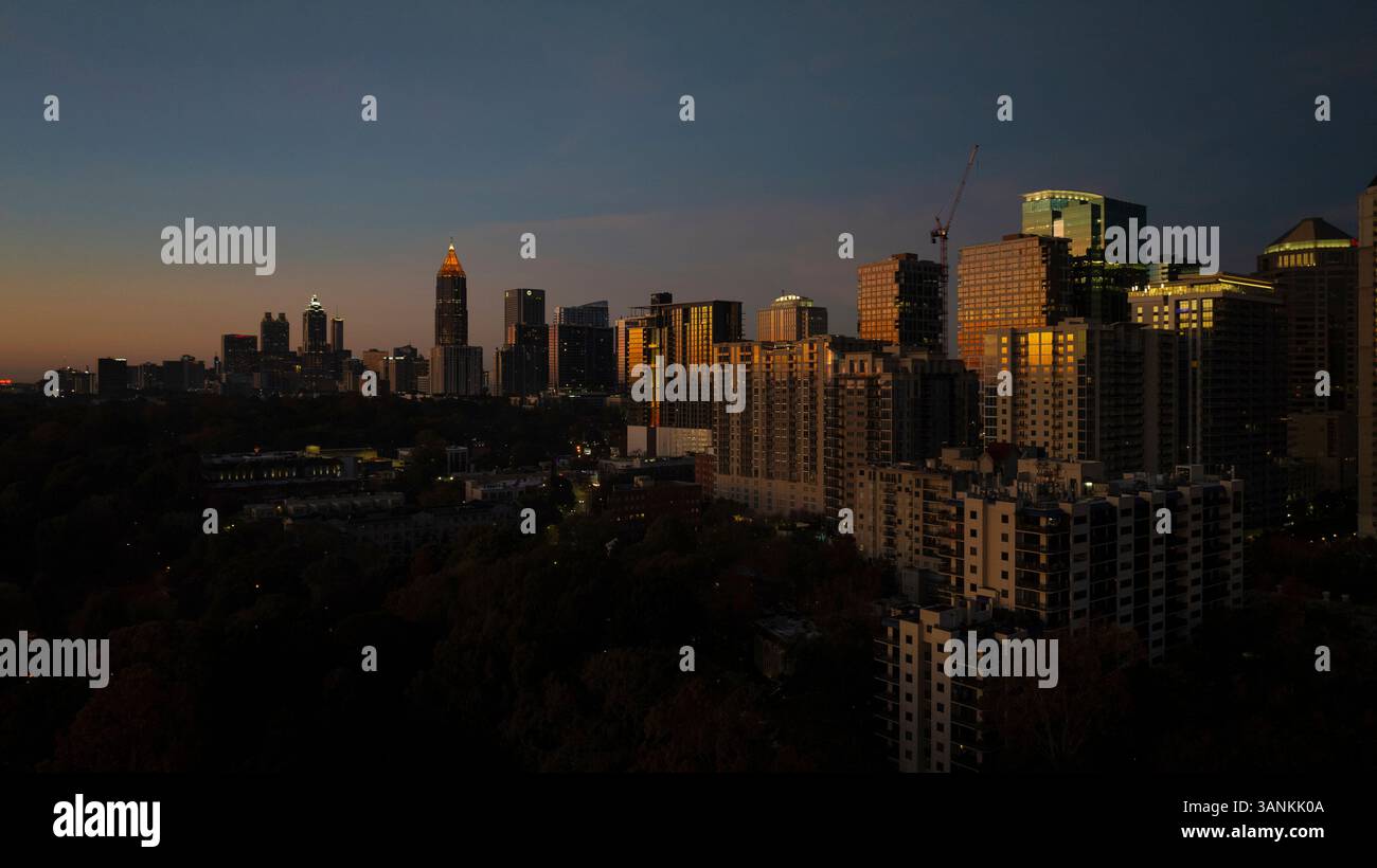 Aerial view of vibrant skyline with illuminated skyscrapers and ...
