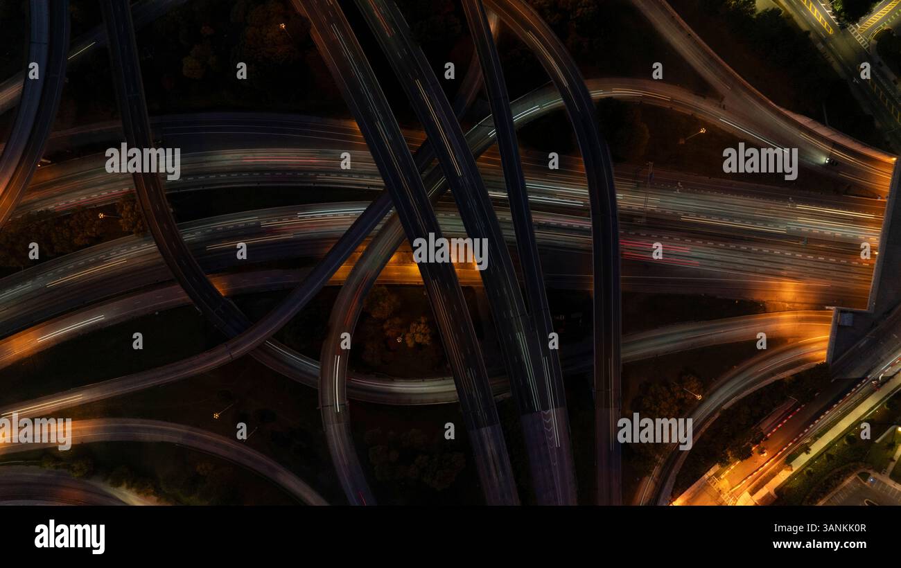Aerial view of busy highway interchange with traffic at night, Atlanta ...