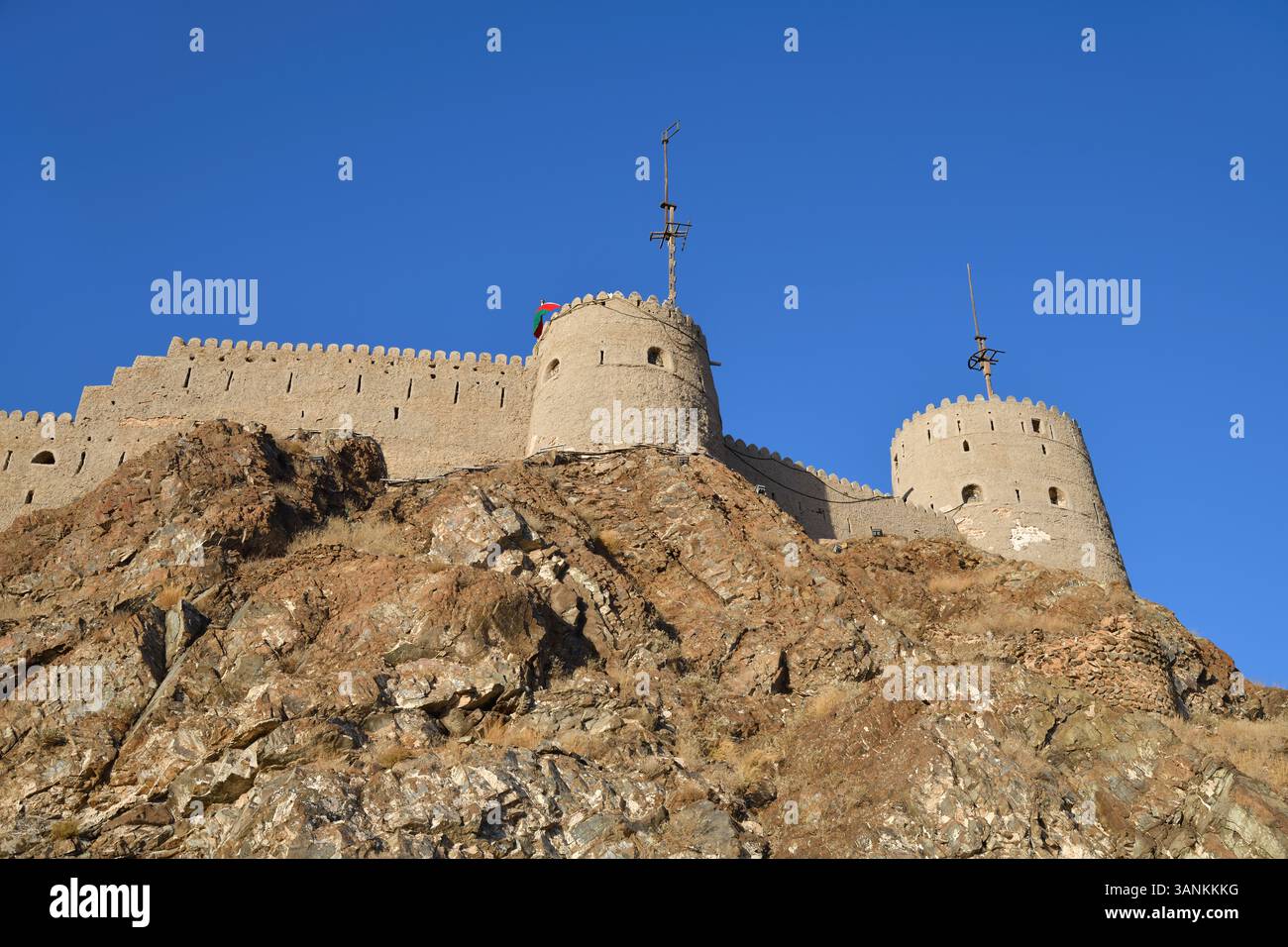 Mutrah Fort in Muscat on top of rock. Sultanate of Oman Stock Photo - Alamy