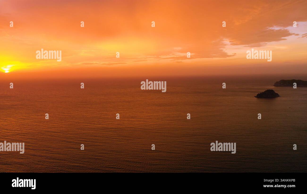 Aerial view of a beautiful sunset over the tranquil Caribbean ocean ...