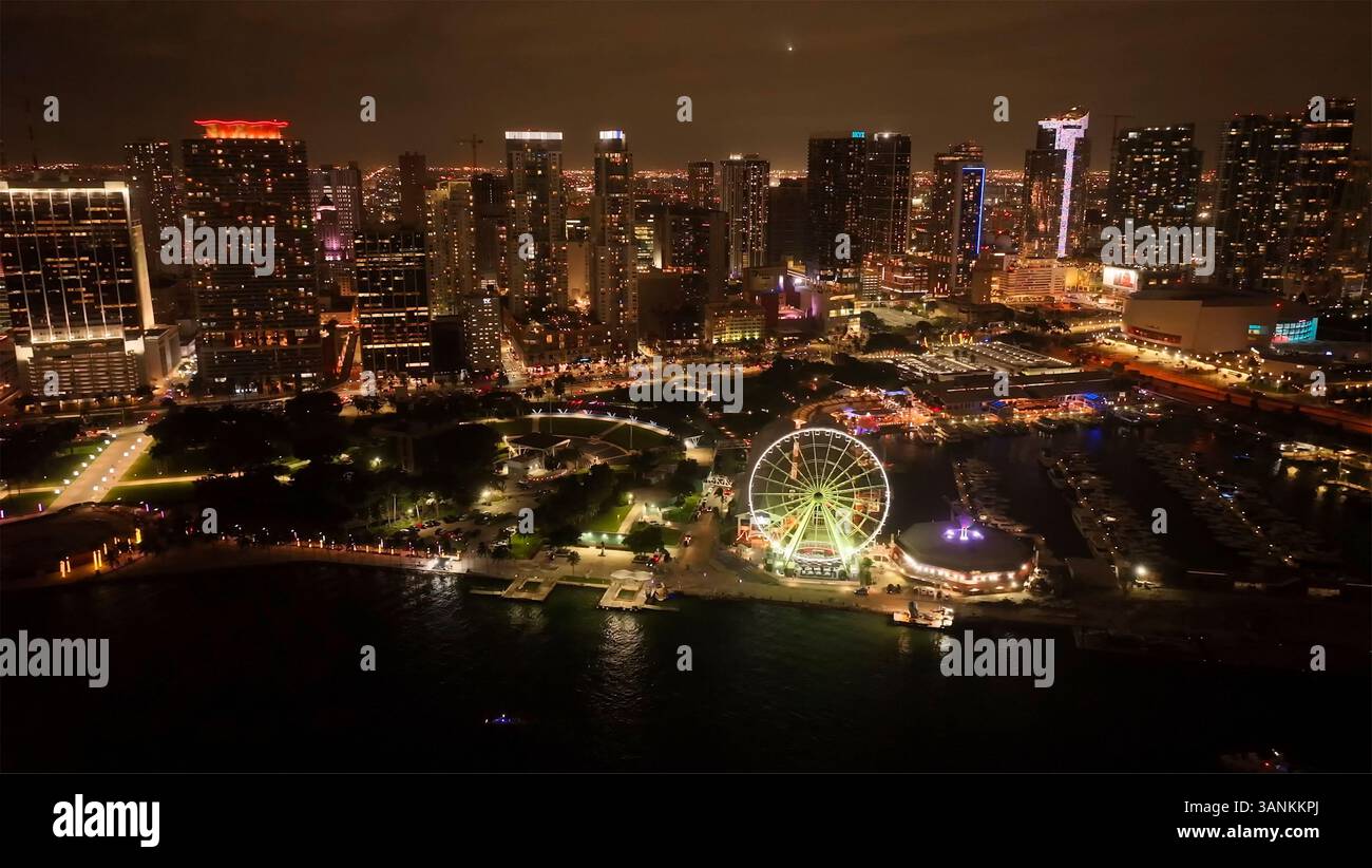 Aerial view of illuminated skyline with Skyviews Miami Observation ...