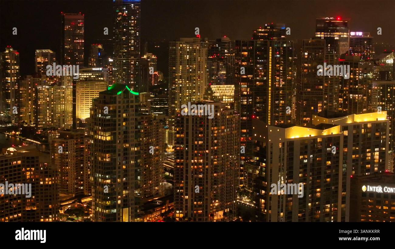 Aerial view of vibrant city lights and illuminated skyscrapers in ...