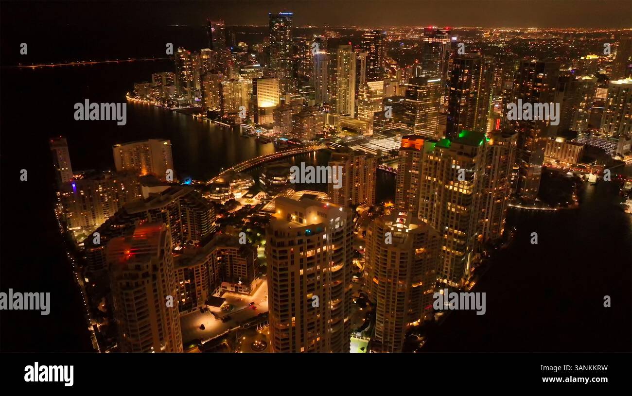 Aerial view of illuminated city lights and modern skyscrapers in ...