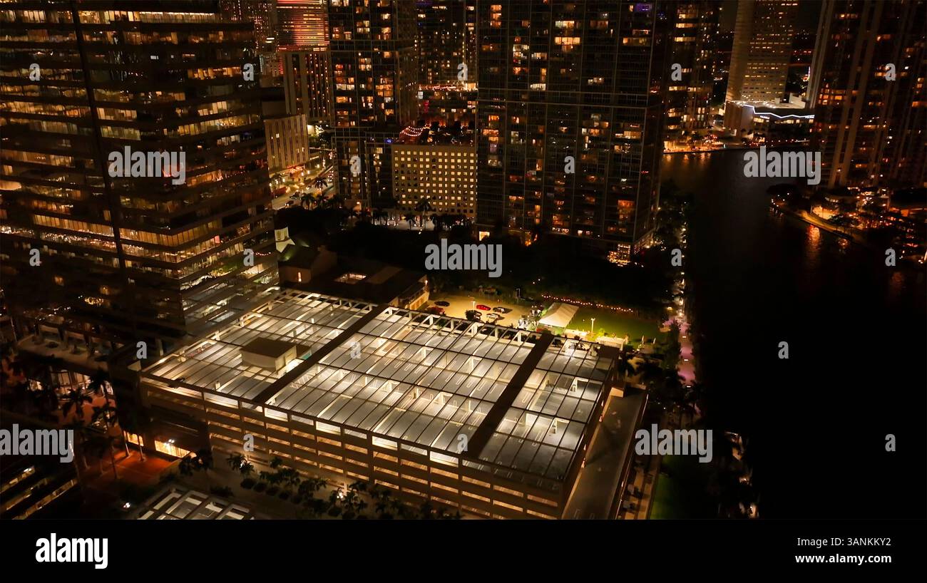 Aerial view of vibrant city lights and modern skyscrapers in downtown ...