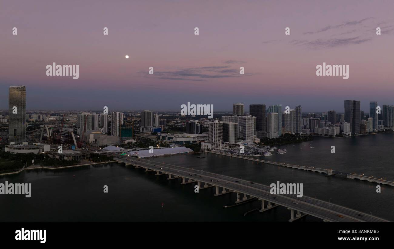 Aerial view of downtown skyline with skyscrapers and moon over Bayfront ...