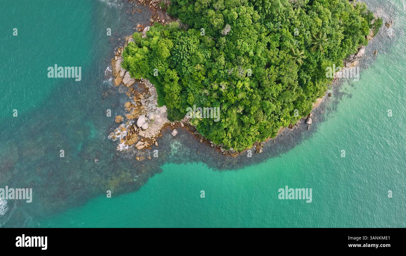 Aerial view of a beautiful tropical island surrounded by clear ...