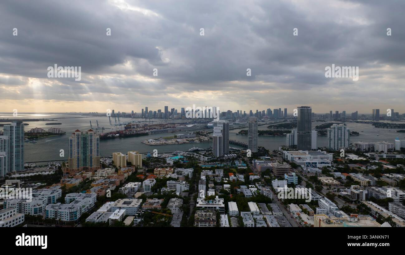 Aerial view of skyline and clouds over downtown Miami Beach with ...