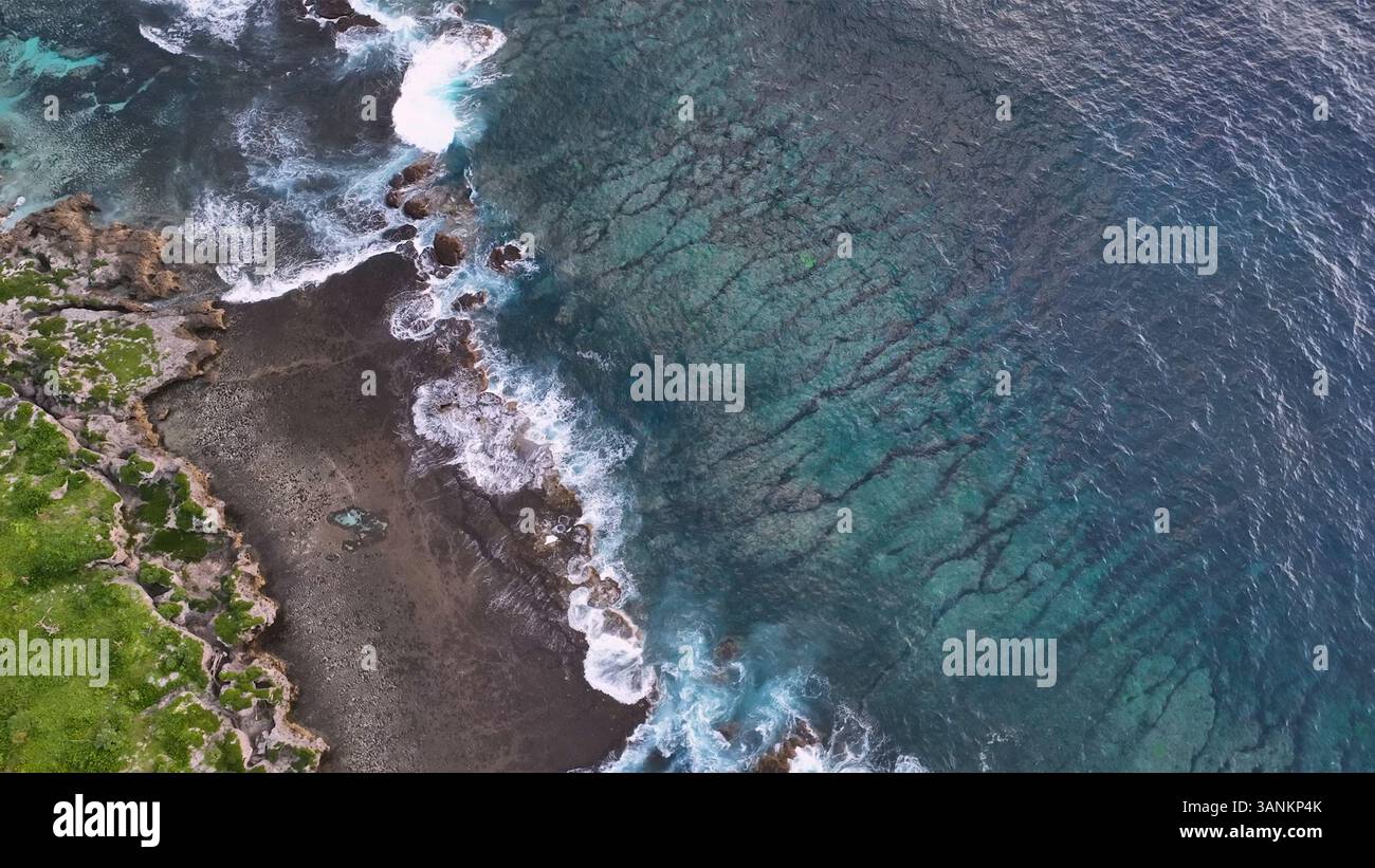 Aerial view of tropical island reef with beautiful ocean waves and ...