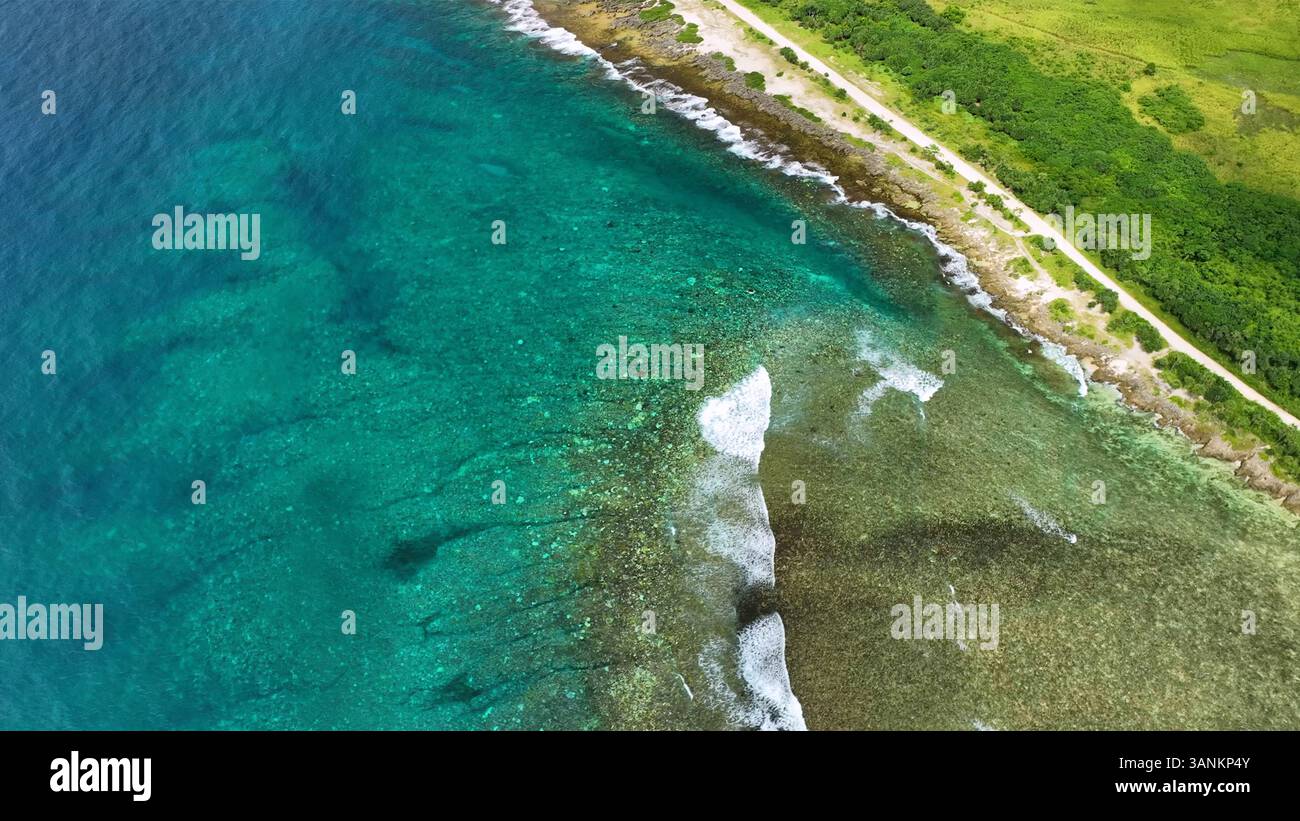 Aerial view of a beautiful tropical island with turquoise water and ...