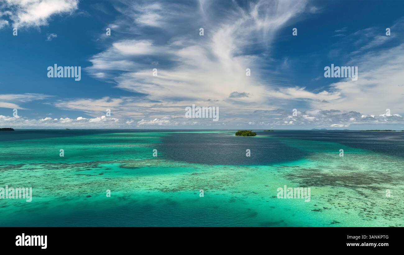 Aerial view of tropical island paradise with azure ocean and unspoiled ...