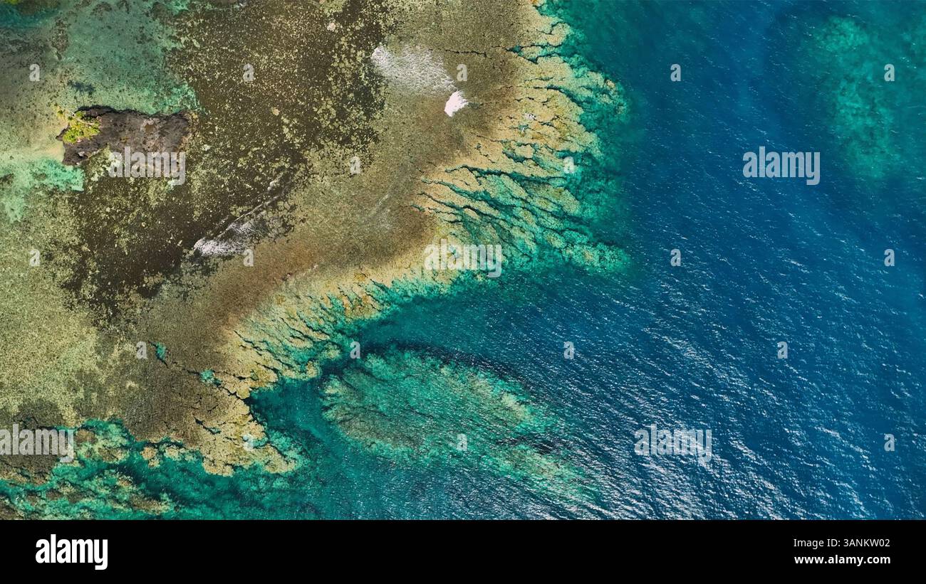 Aerial view of beautiful tropical island with crystal clear waters and ...